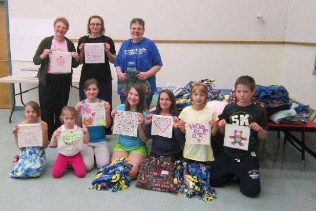 4-H Art Club members make blankets for local children in need