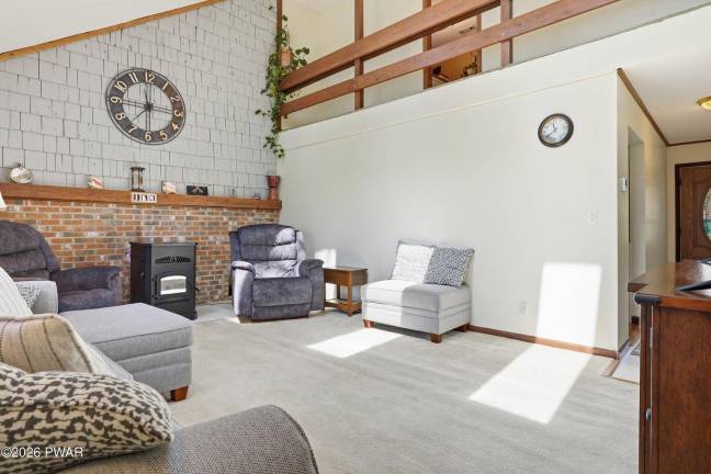 Live and work from this home with panoramic views, pond and pool