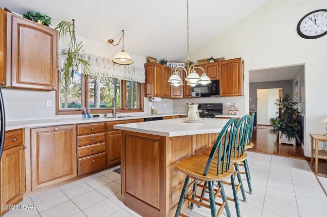 Live and work from this home with panoramic views, pond and pool