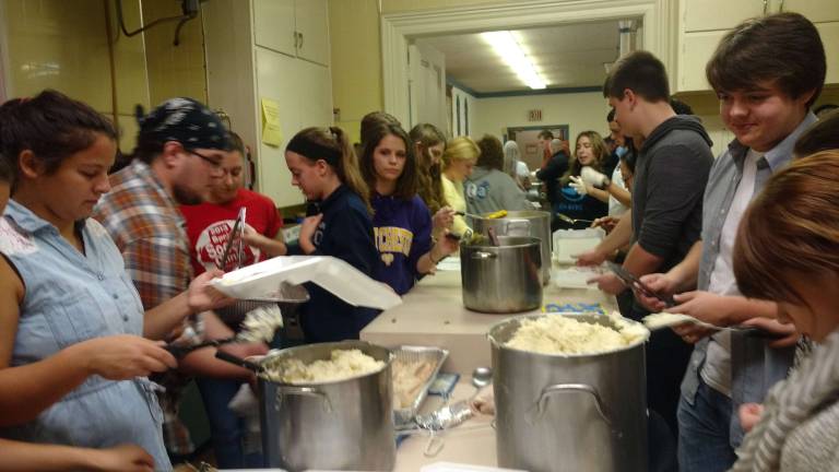 Helping hands and heaping plates